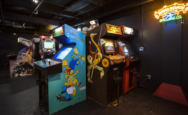 Arcade games are paired with craft beers and cocktails at the Coin-Op ...